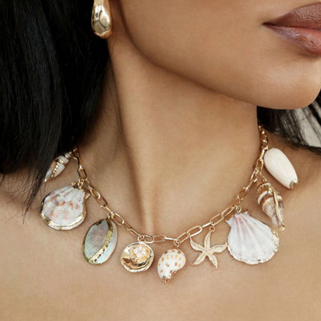 Shell Jewelry: Cowrie, Puka, Mermaid, and More Pretty Seashells – Ettika